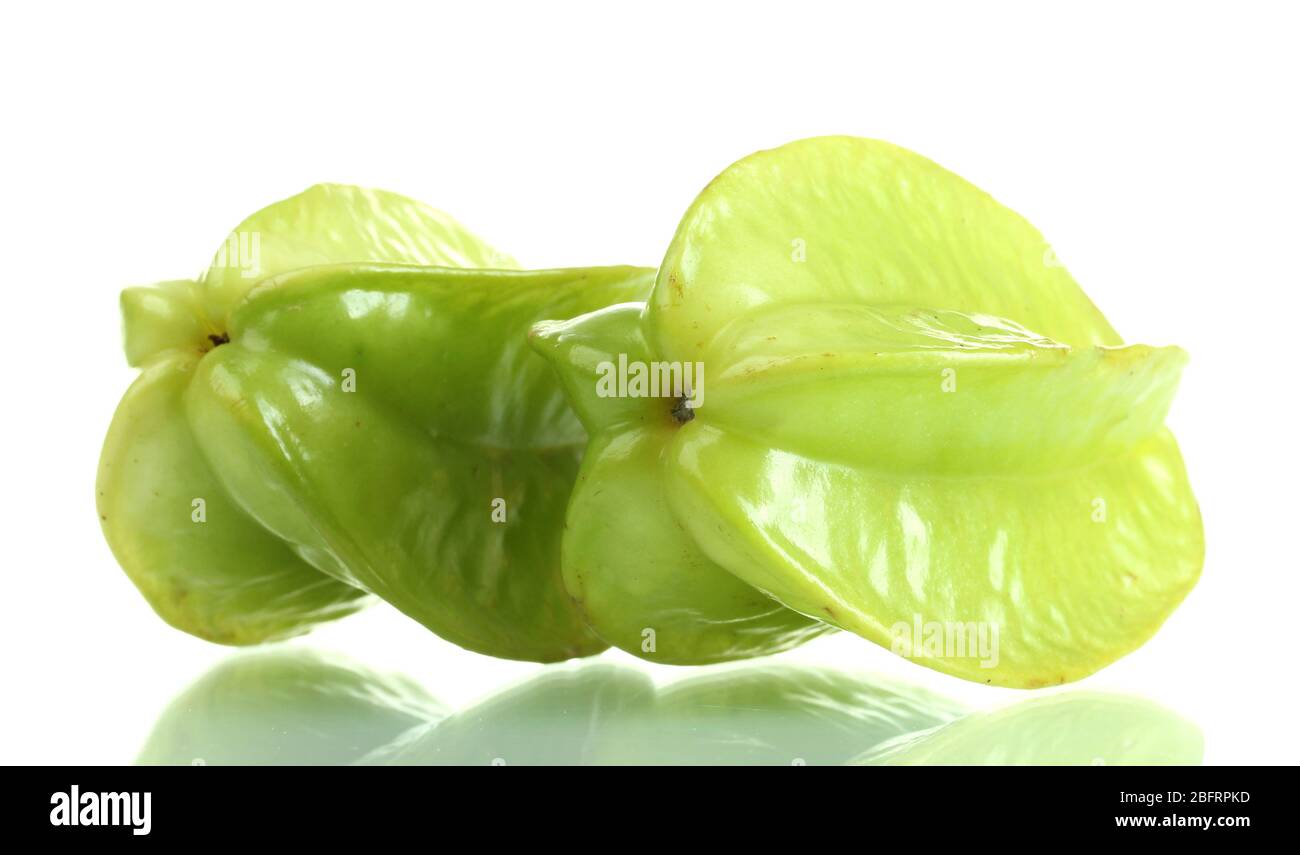 two fresh carambola fruits isolated on white Stock Photo - Alamy