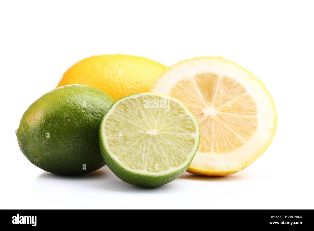 Fresh lime and lemon isolated on white Stock Photo - Alamy