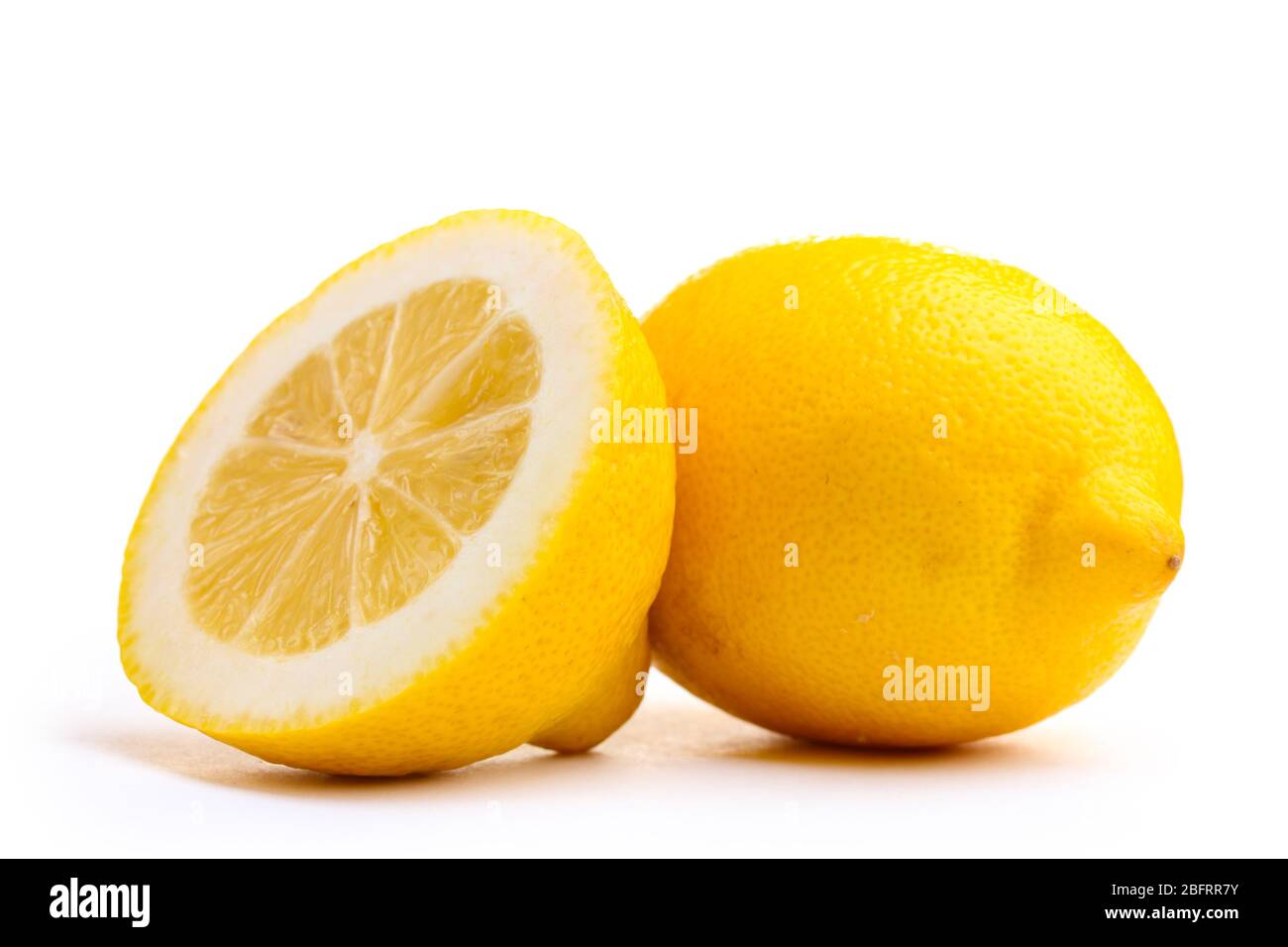 Fresh lemon isolated on white Stock Photo - Alamy