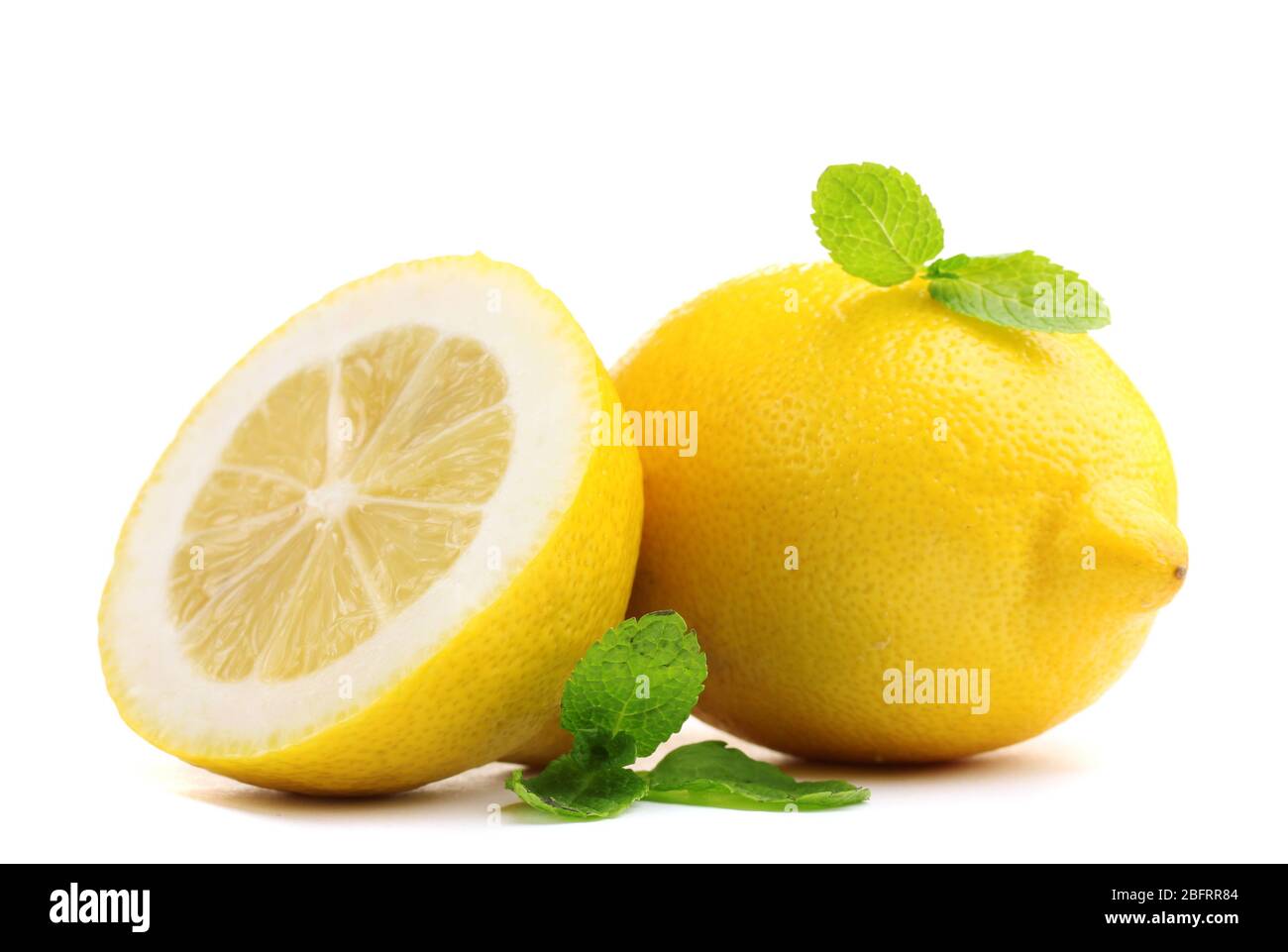 Fresh lemon with mint isolated on white Stock Photo - Alamy