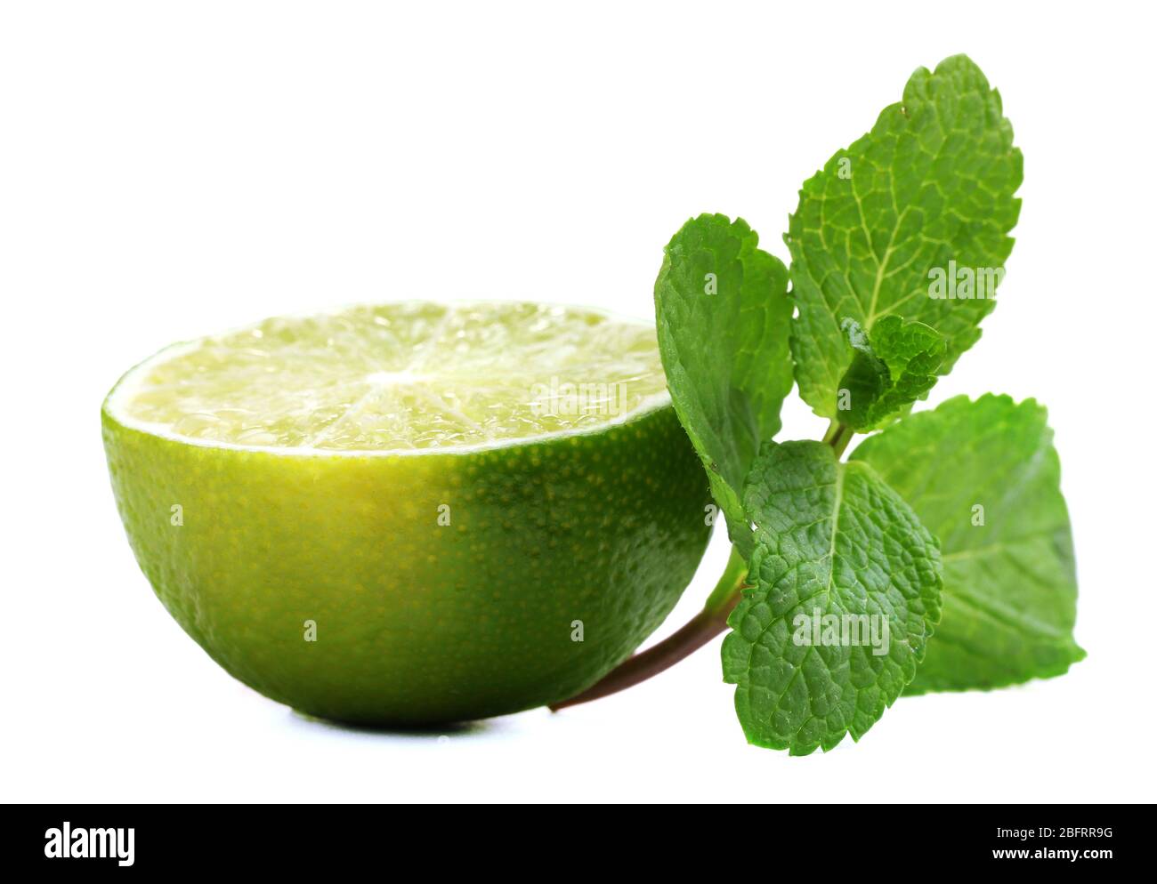 Fresh lime and mint isolated on white Stock Photo - Alamy