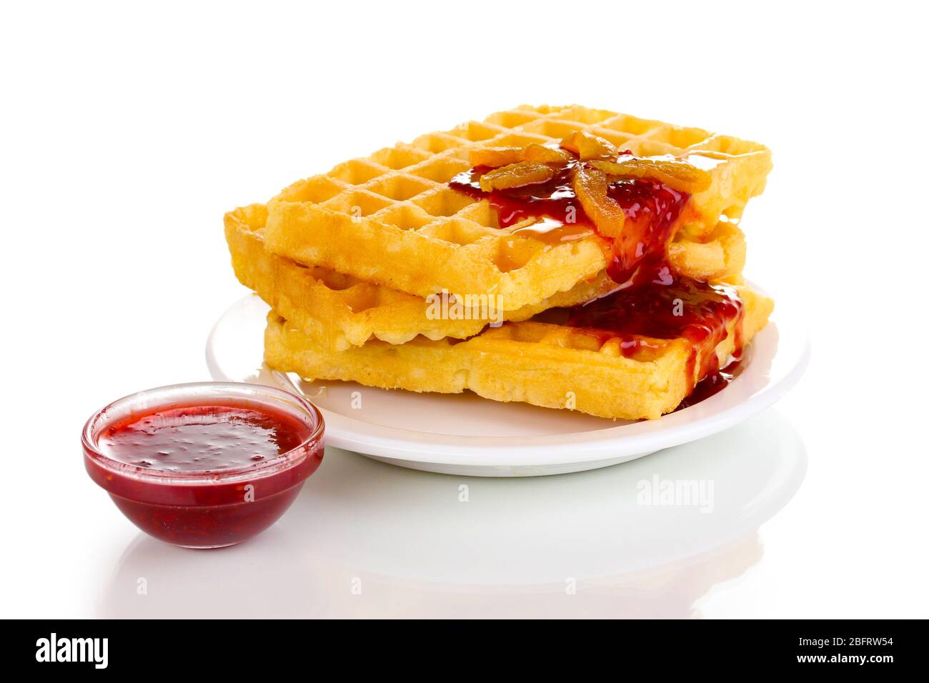 Tasty waffles with jam on plate isolated on white Stock Photo - Alamy
