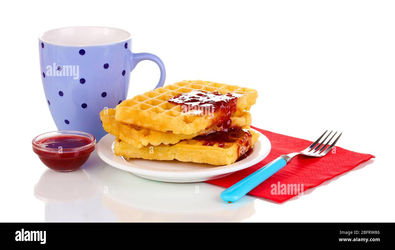 Tasty waffles with jam on plate isolated on white Stock Photo - Alamy