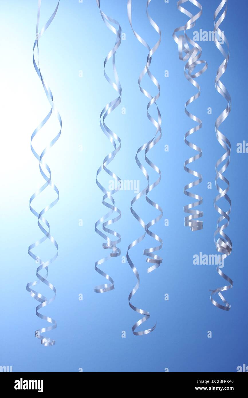 Shiny serpentine streamers on hi-res stock photography and images - Alamy