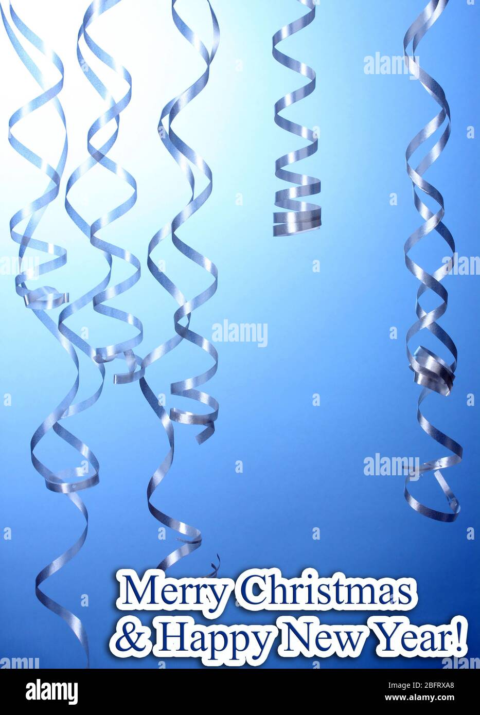 beautiful streamers on blue background Stock Photo - Alamy