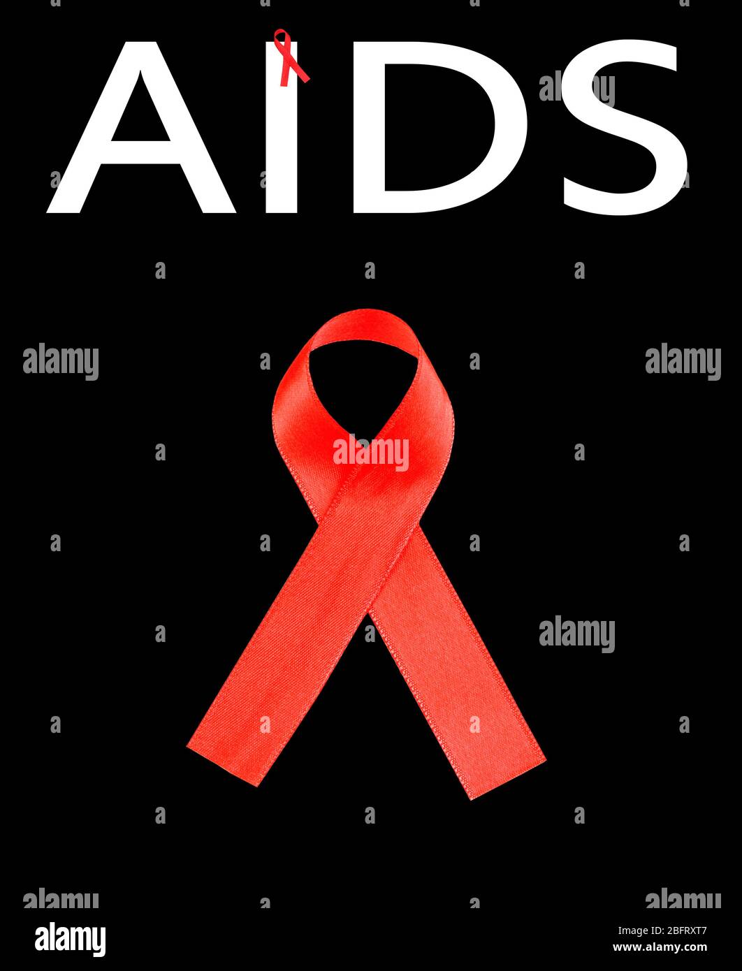 Aids awareness red ribbon isolated on black Stock Photo - Alamy