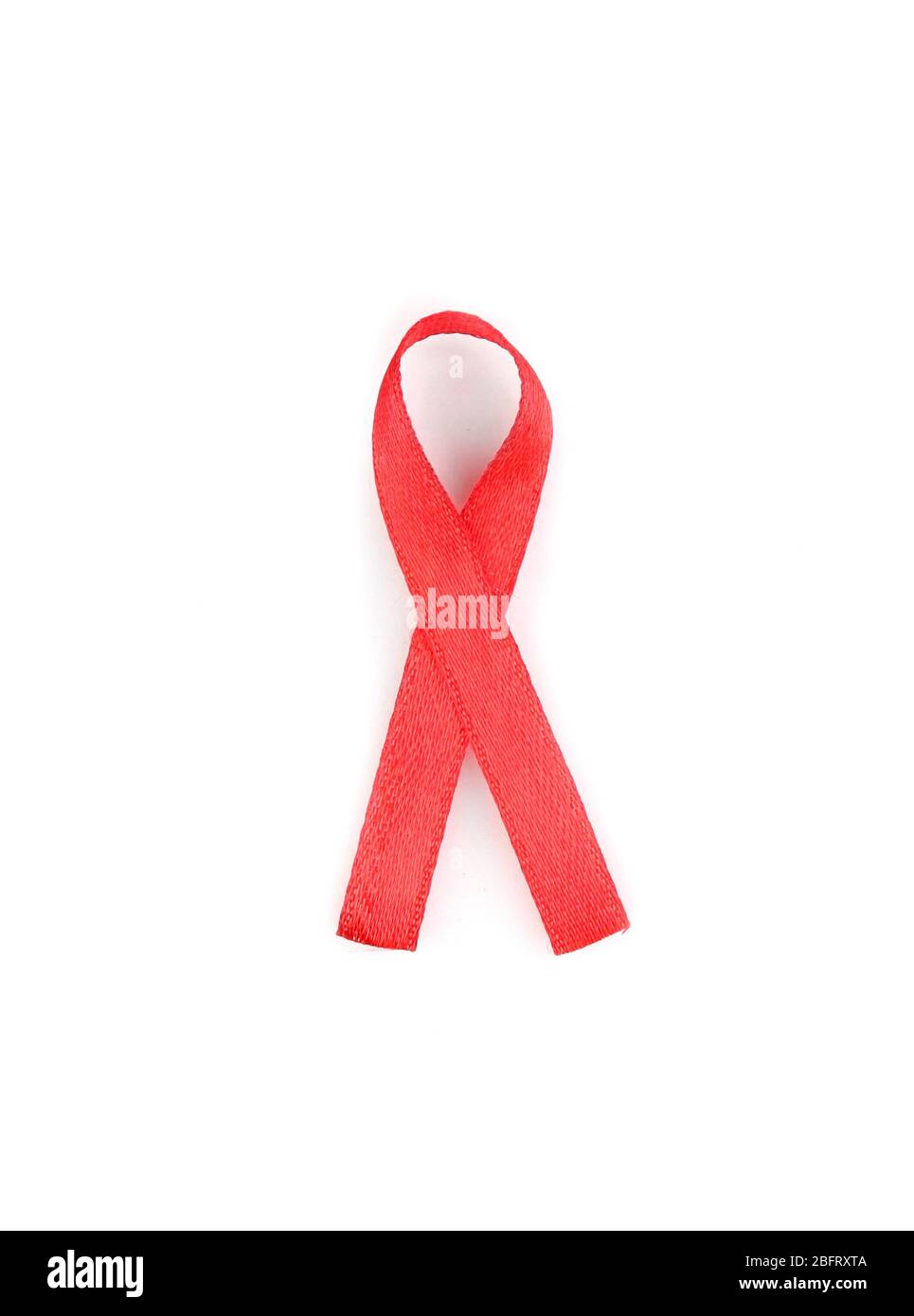 Aids awareness red ribbon isolated on white Stock Photo - Alamy