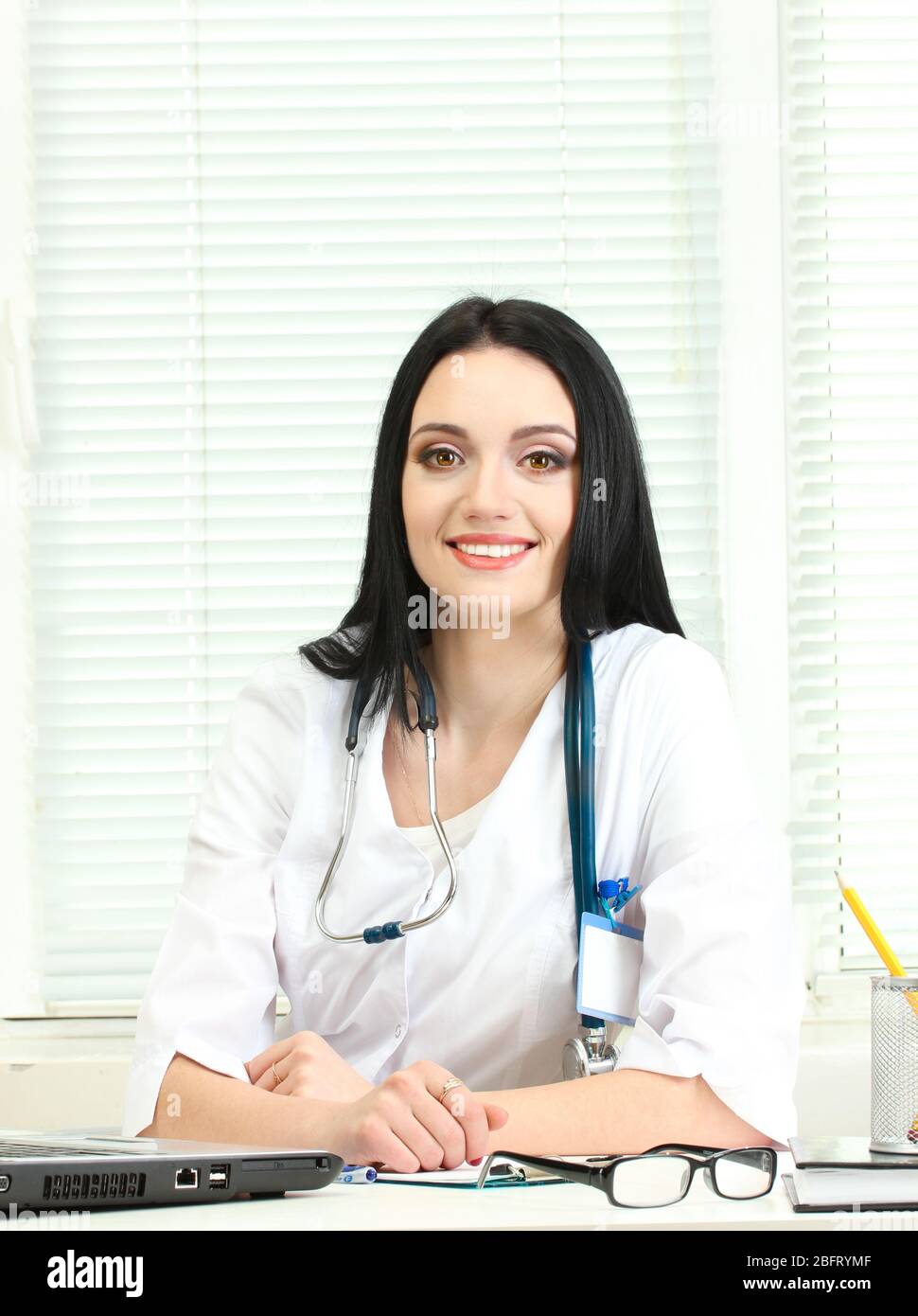 beautiful girl doctor in the office Stock Photo - Alamy