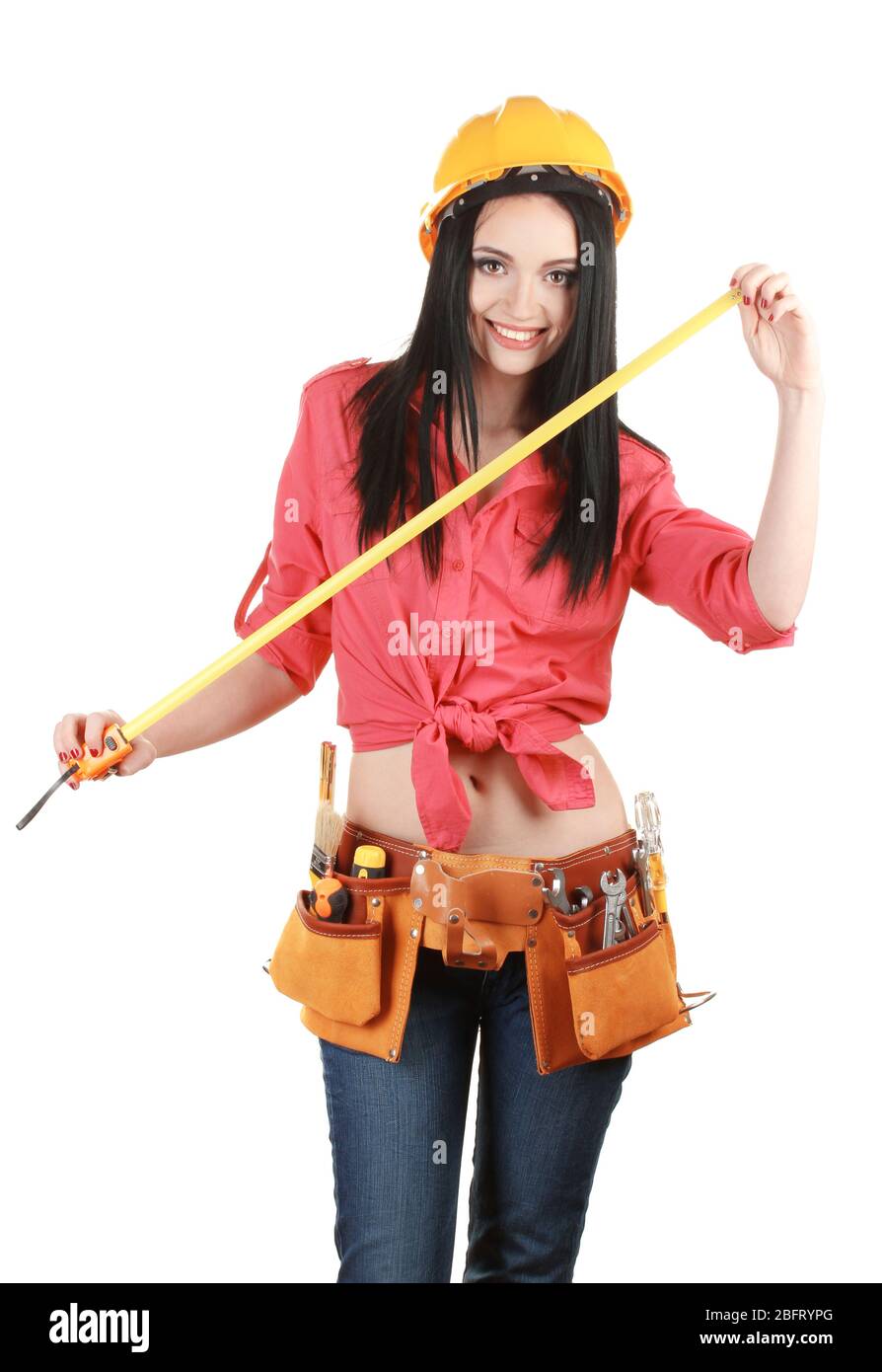 beautiful young girl-builder holding building roulette isolated on ...