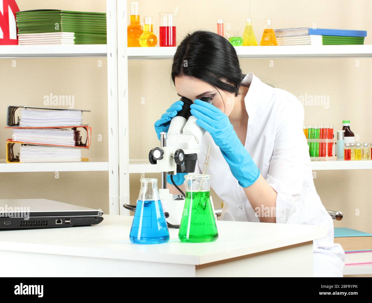 Lady in lab coat microscope hi-res stock photography and images - Alamy