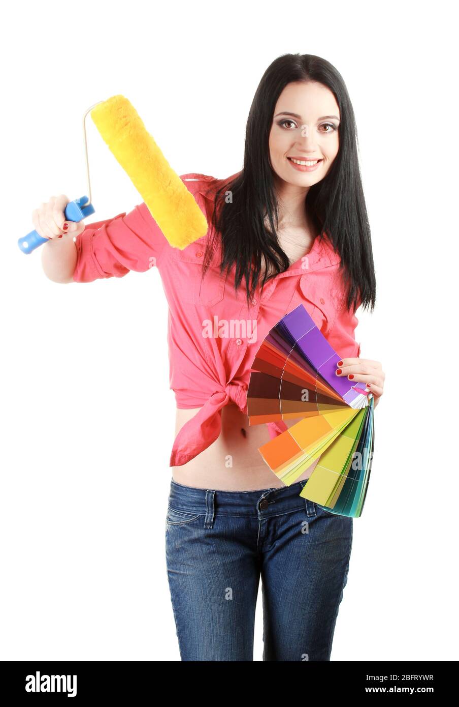 Beautiful young woman decorator isolated on white Stock Photo - Alamy