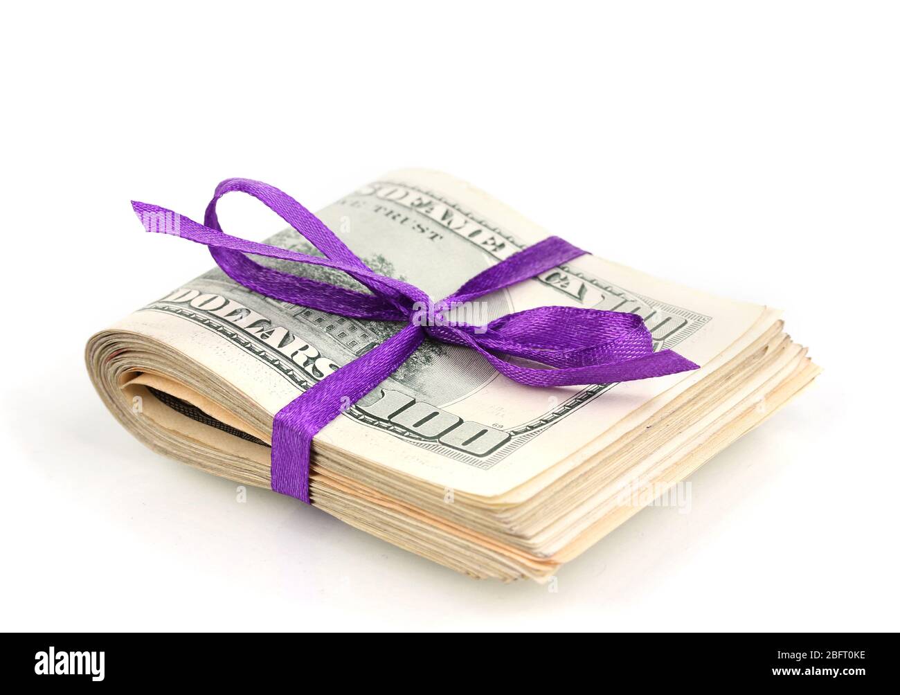 Dollar banknotes tied with ribbon isolated on white Stock Photo - Alamy