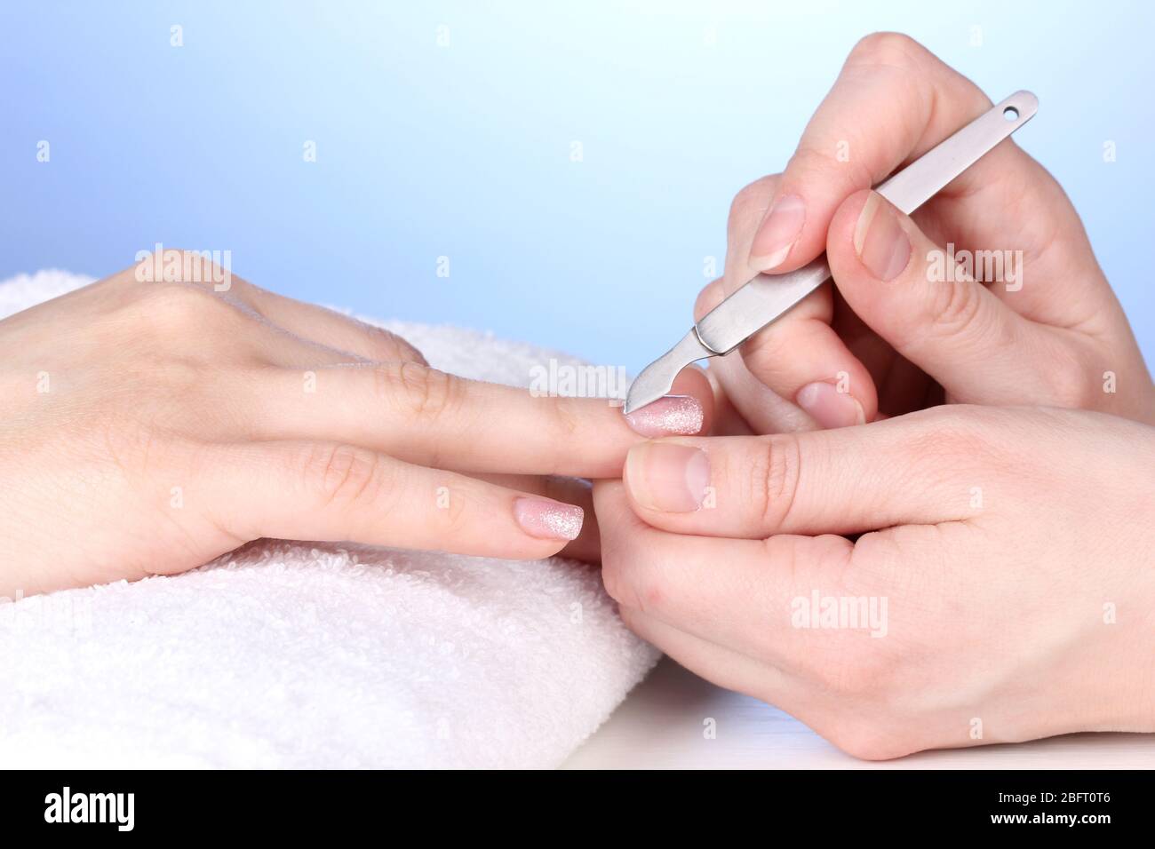 Manicure process in salon Stock Photo - Alamy