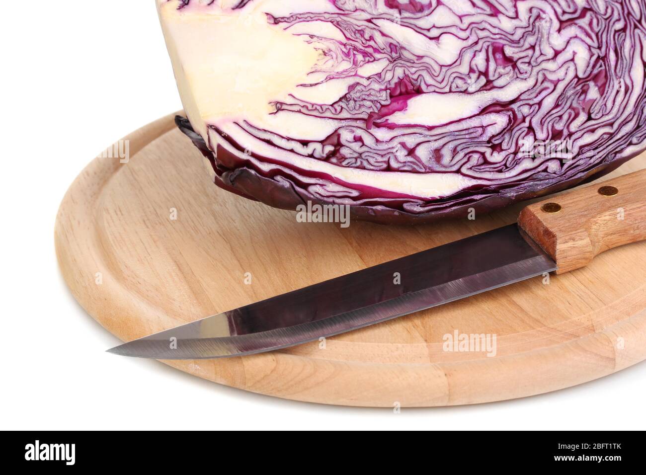 Red cabbage on wooden chopping board close-up isolated on white Stock ...