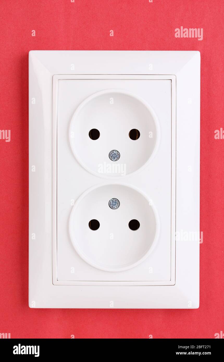 White electric socket on the wall Stock Photo - Alamy