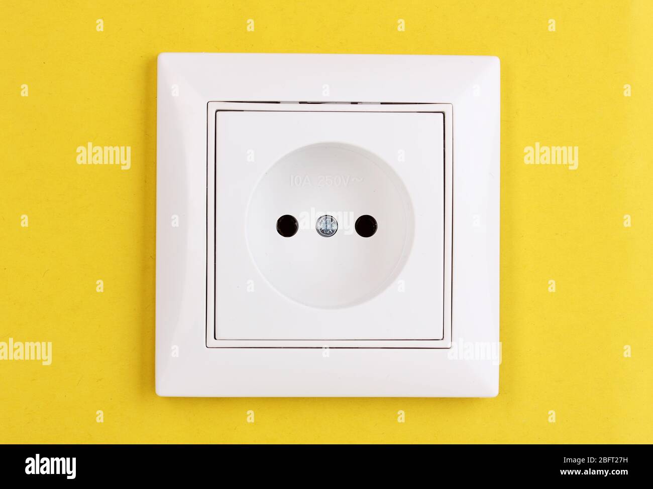 White electric socket on the wall Stock Photo - Alamy