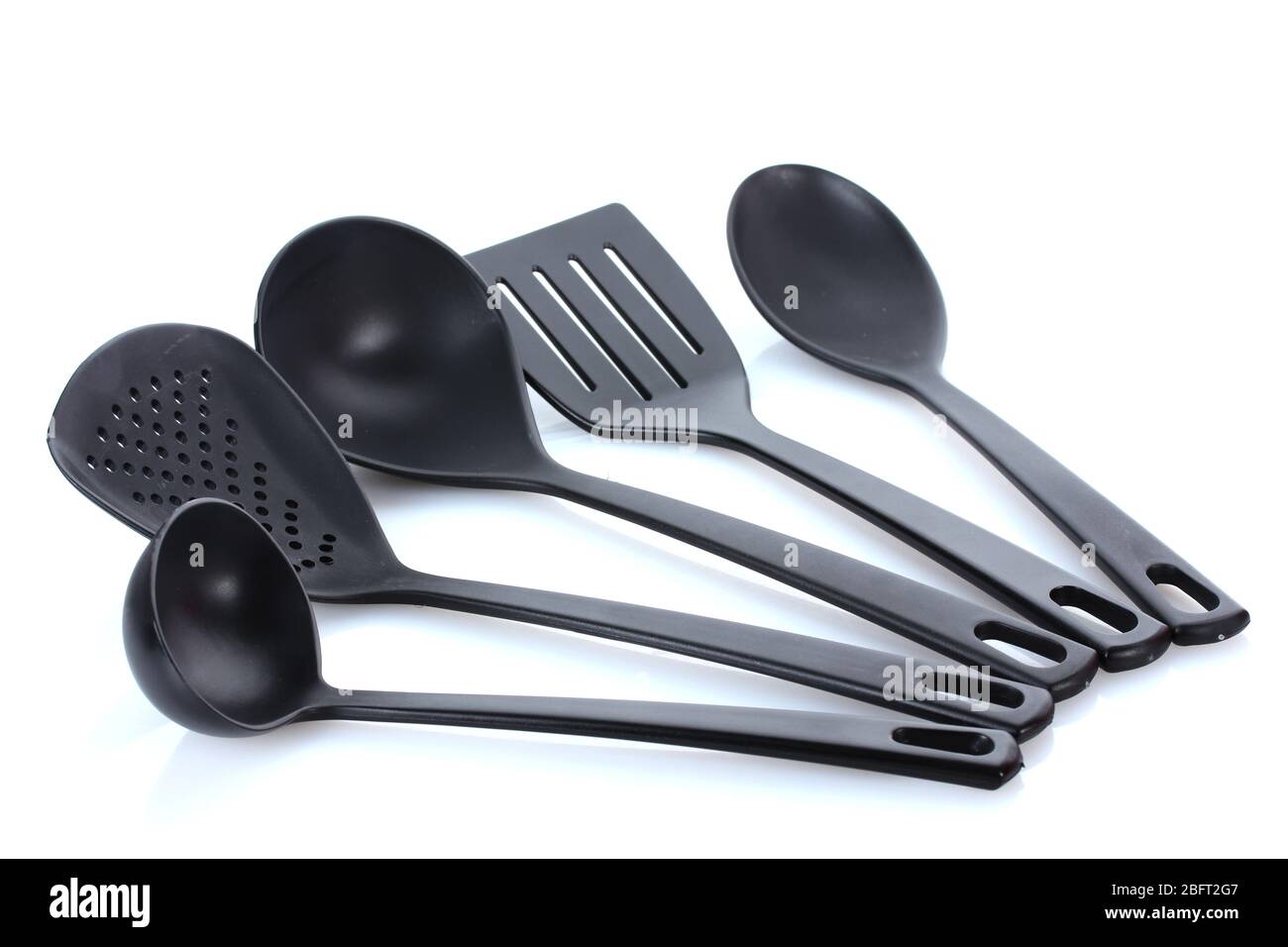 black kitchen utensils isolated on white Stock Photo - Alamy