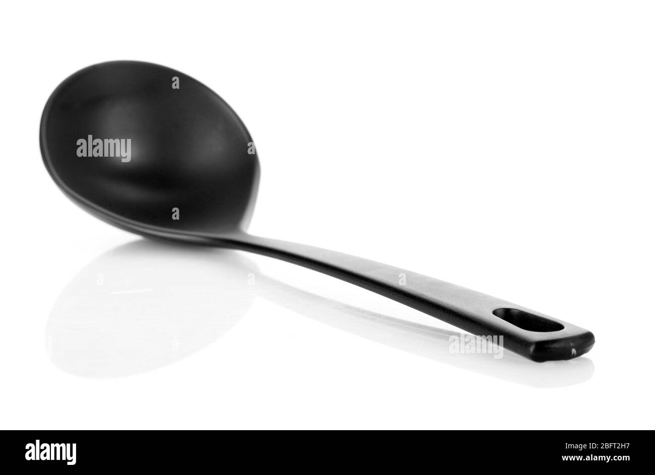 black kitchen ladle isolated on white Stock Photo - Alamy