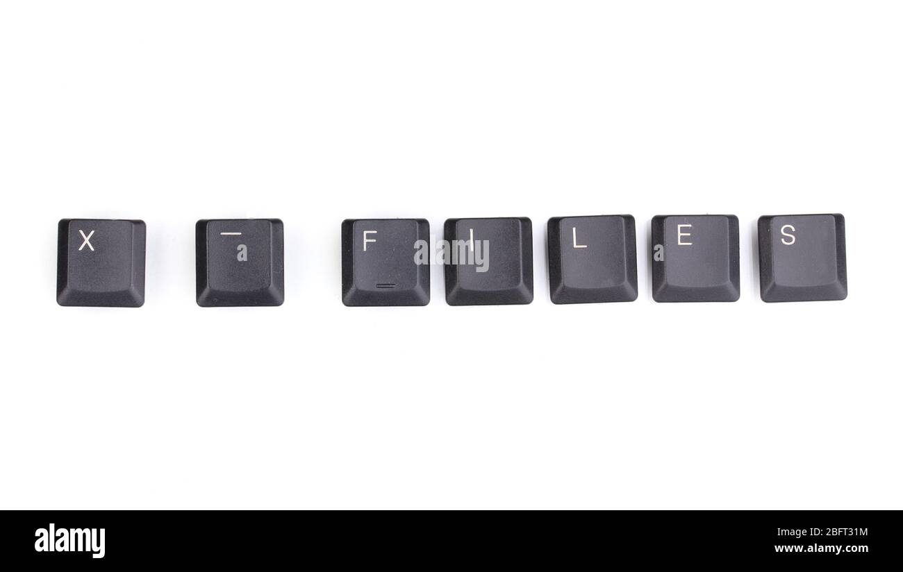 Keyboard keys saying x-files isolated on white Stock Photo - Alamy