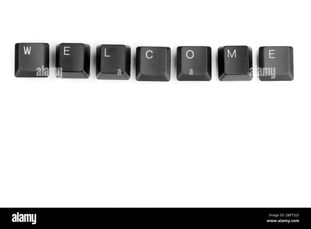 Keyboard keys saying welcome isolated on white Stock Photo - Alamy