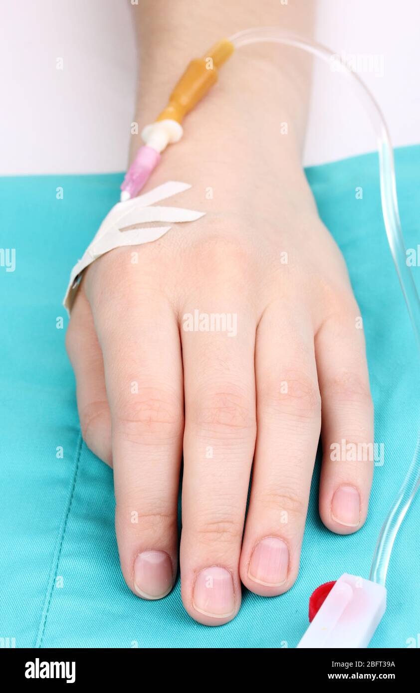 Female arm with infusion Stock Photo - Alamy