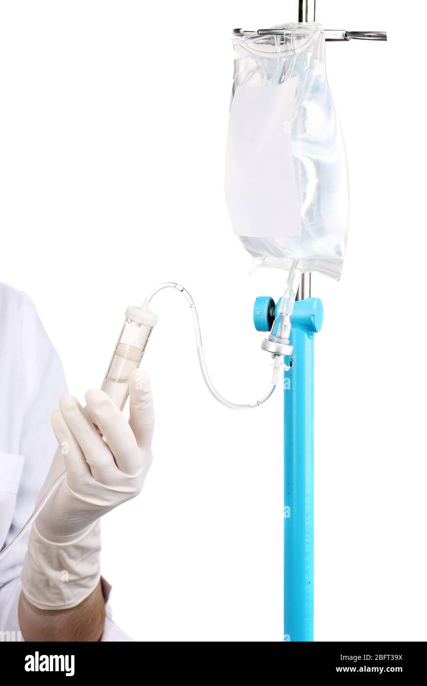 Nurse doing infusion isolated on white Stock Photo - Alamy