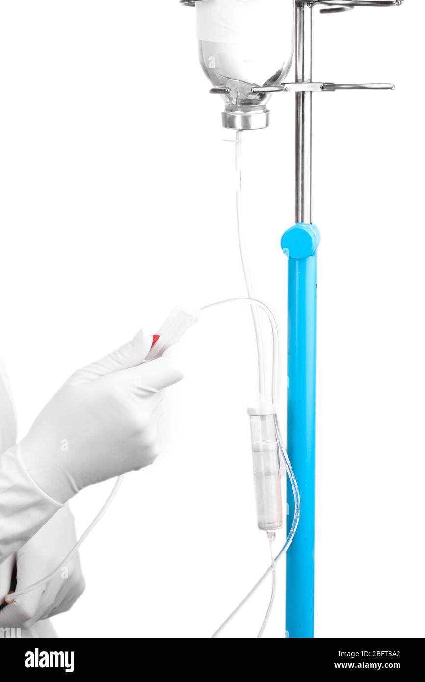 Nurse doing infusion isolated on white Stock Photo - Alamy