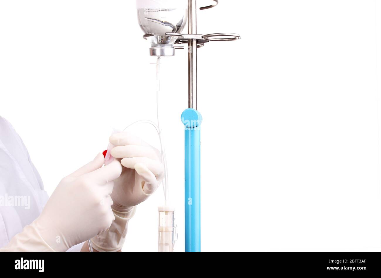 Nurse doing infusion isolated on white Stock Photo - Alamy