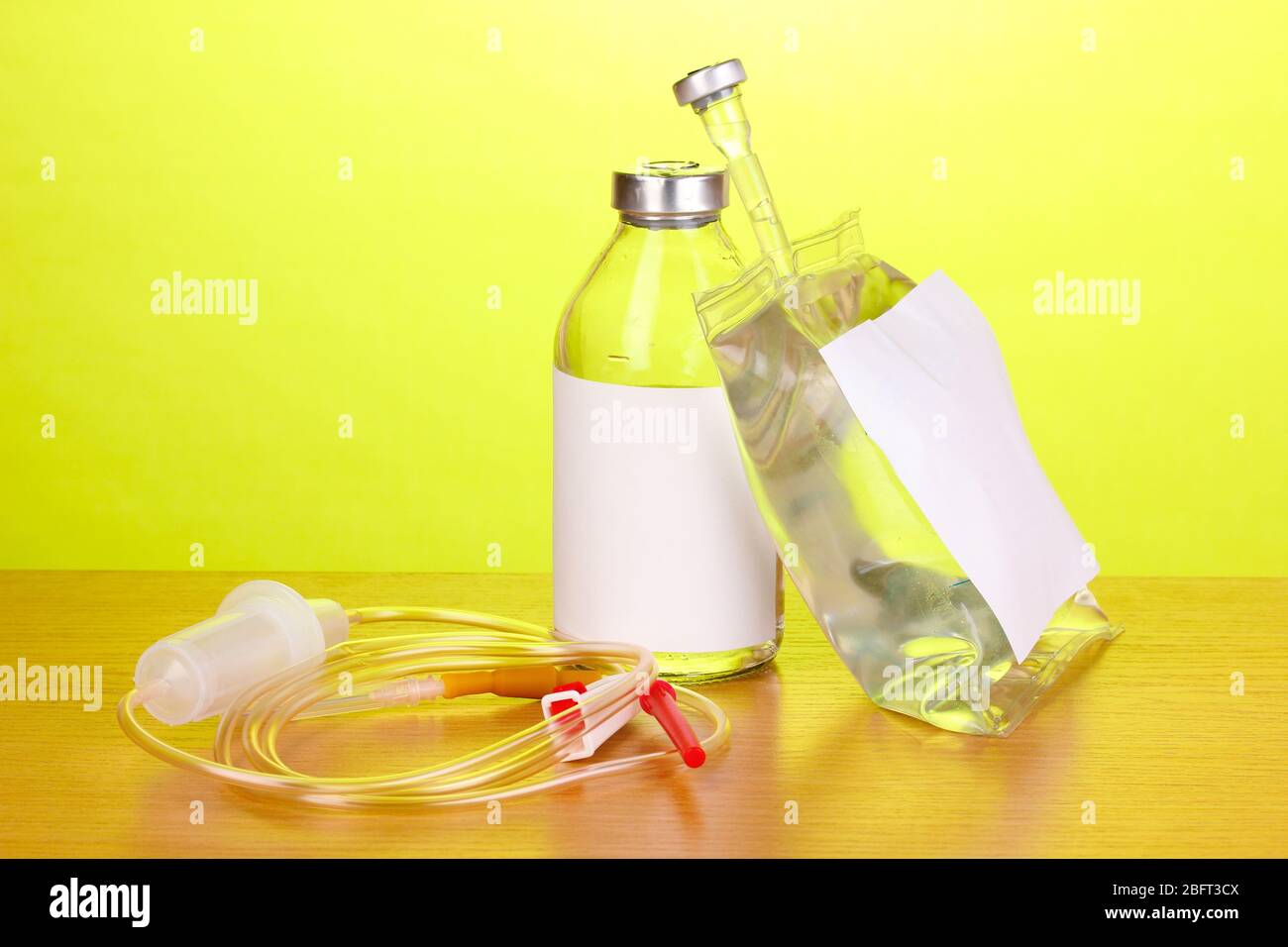 Bottle and bag of intravenous antibiotics and plastic infusion set on ...