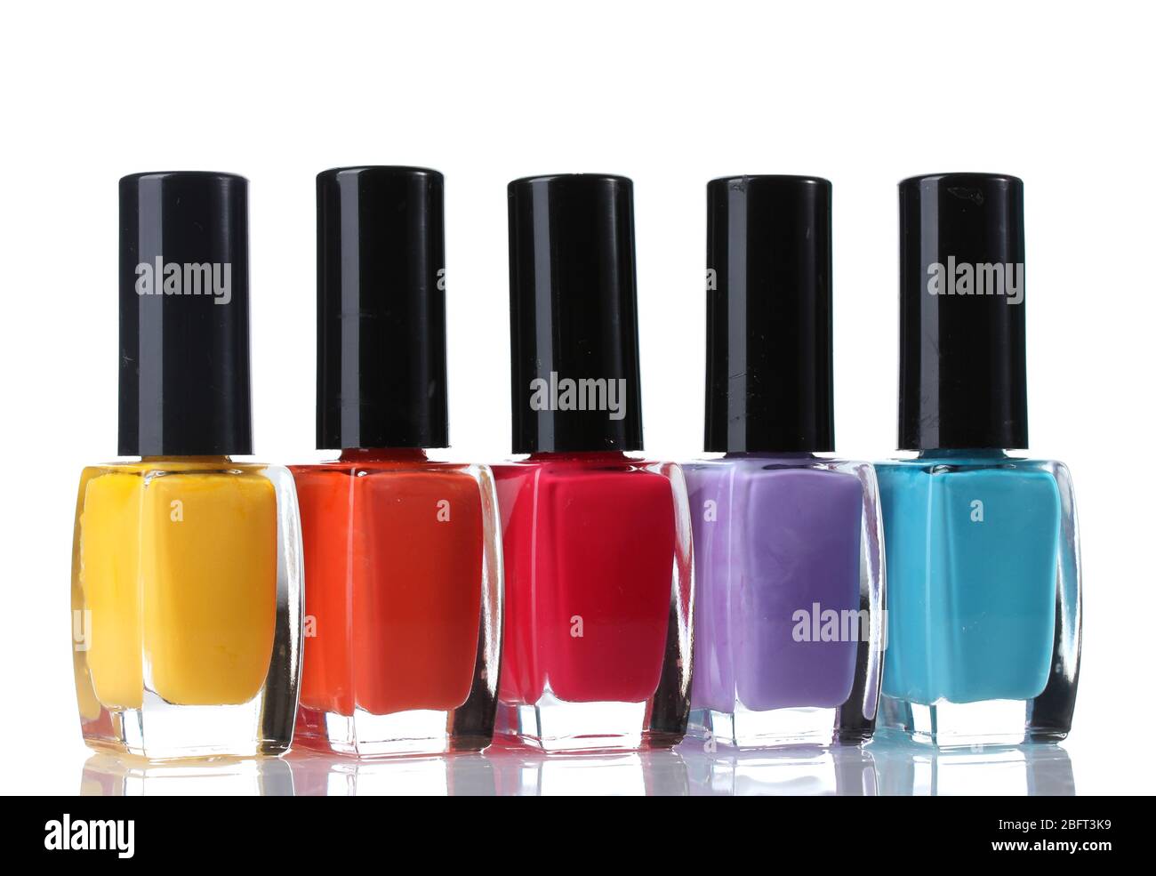 Group of bright nail polishes isolated on white Stock Photo - Alamy