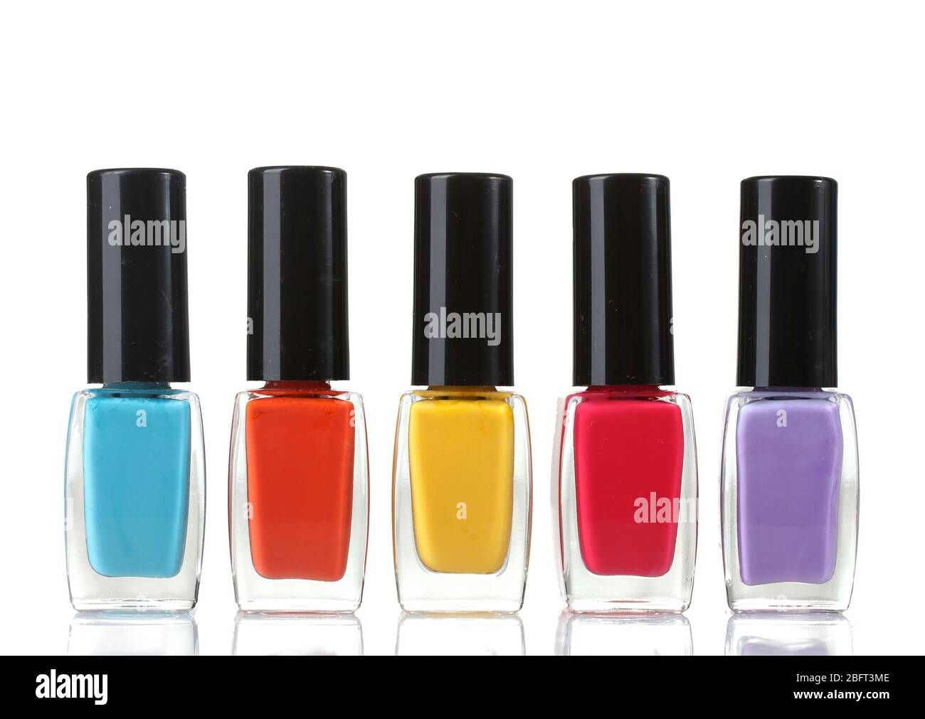 Group of bright nail polishes isolated on white Stock Photo - Alamy