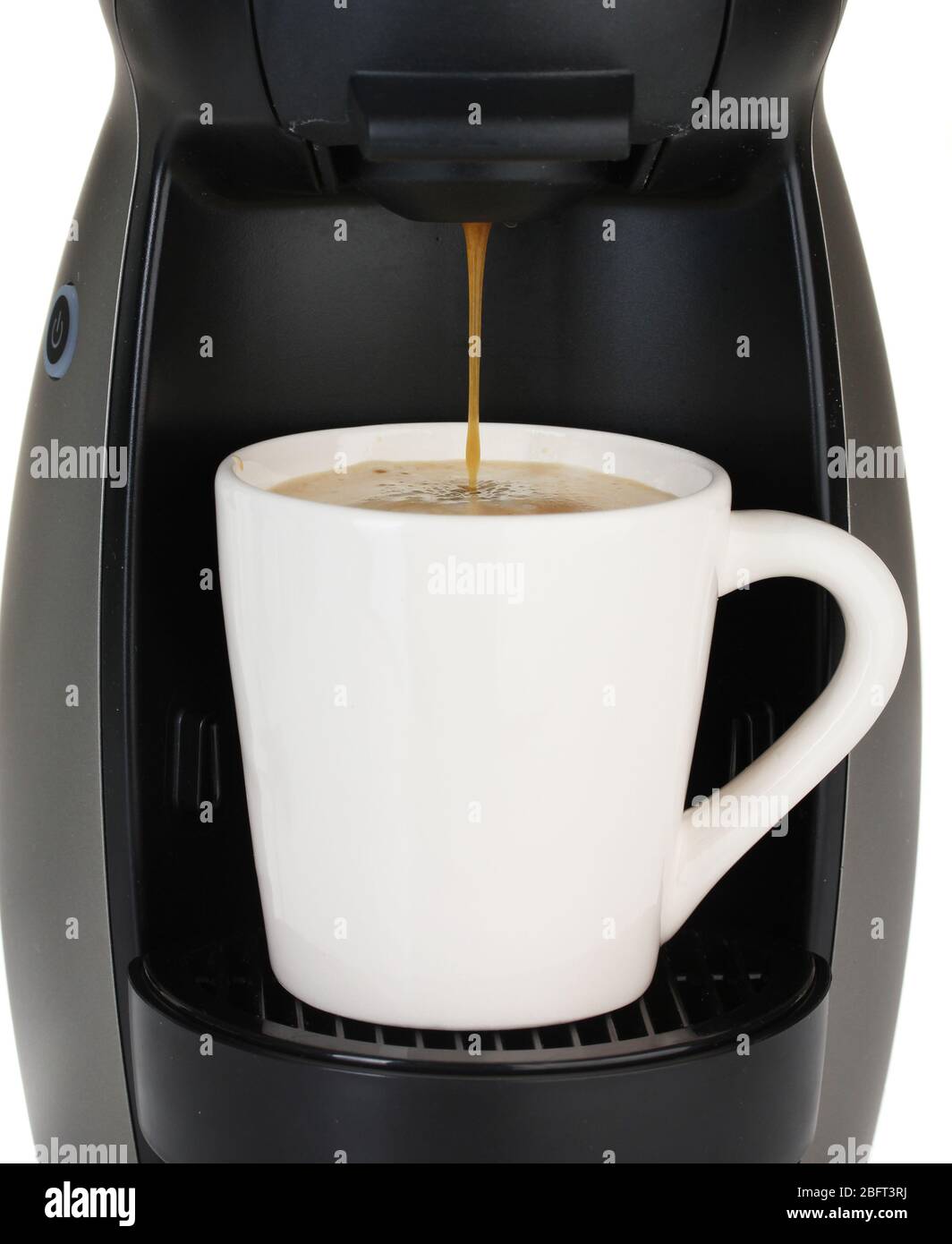 Espresso machine pouring coffee in white cup Stock Photo - Alamy