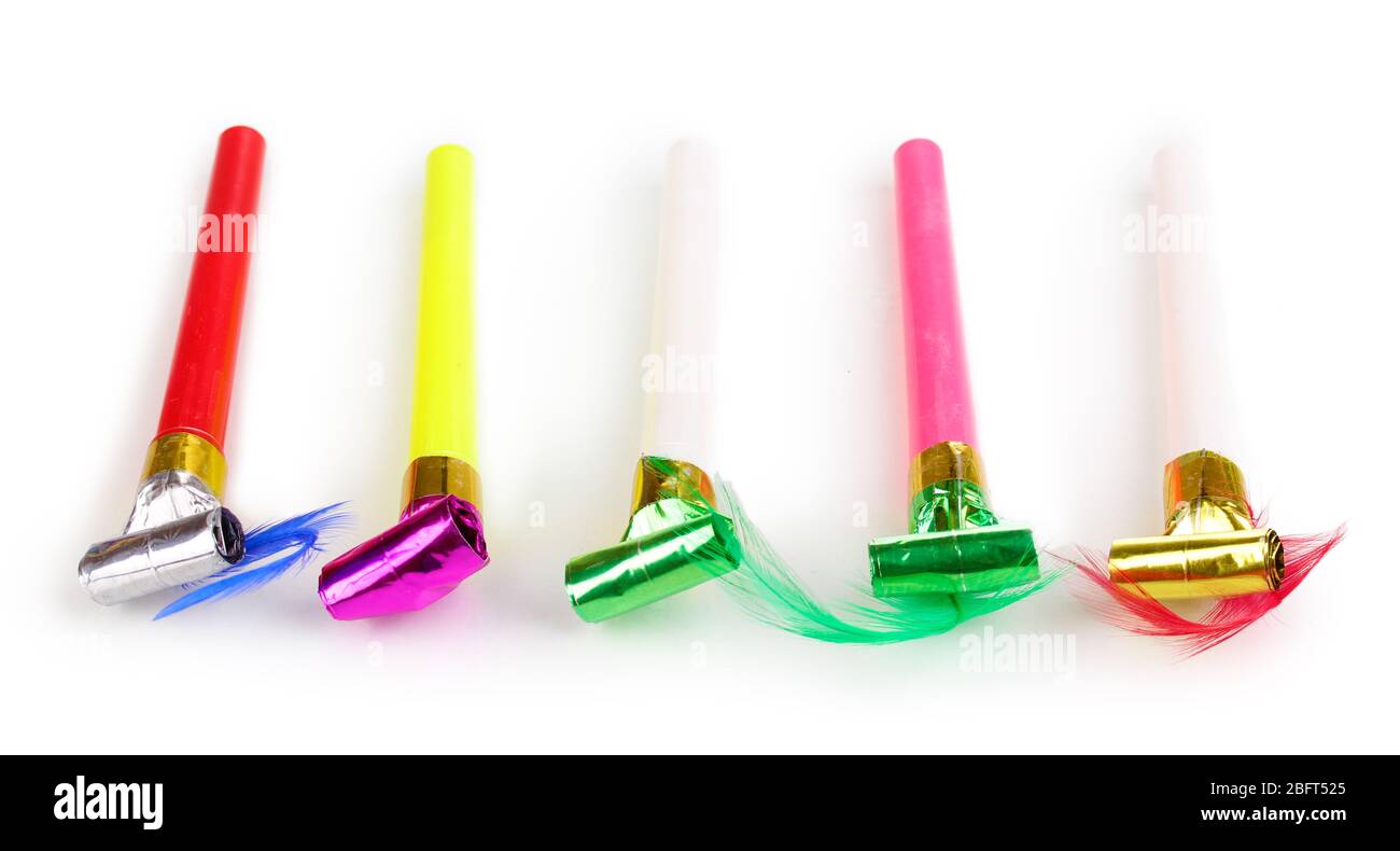 Party whistles isolated on white Stock Photo - Alamy