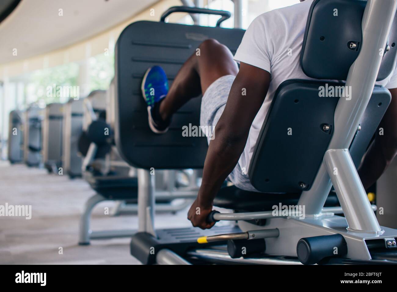 Man leg press back not woman hi-res stock photography and images - Alamy
