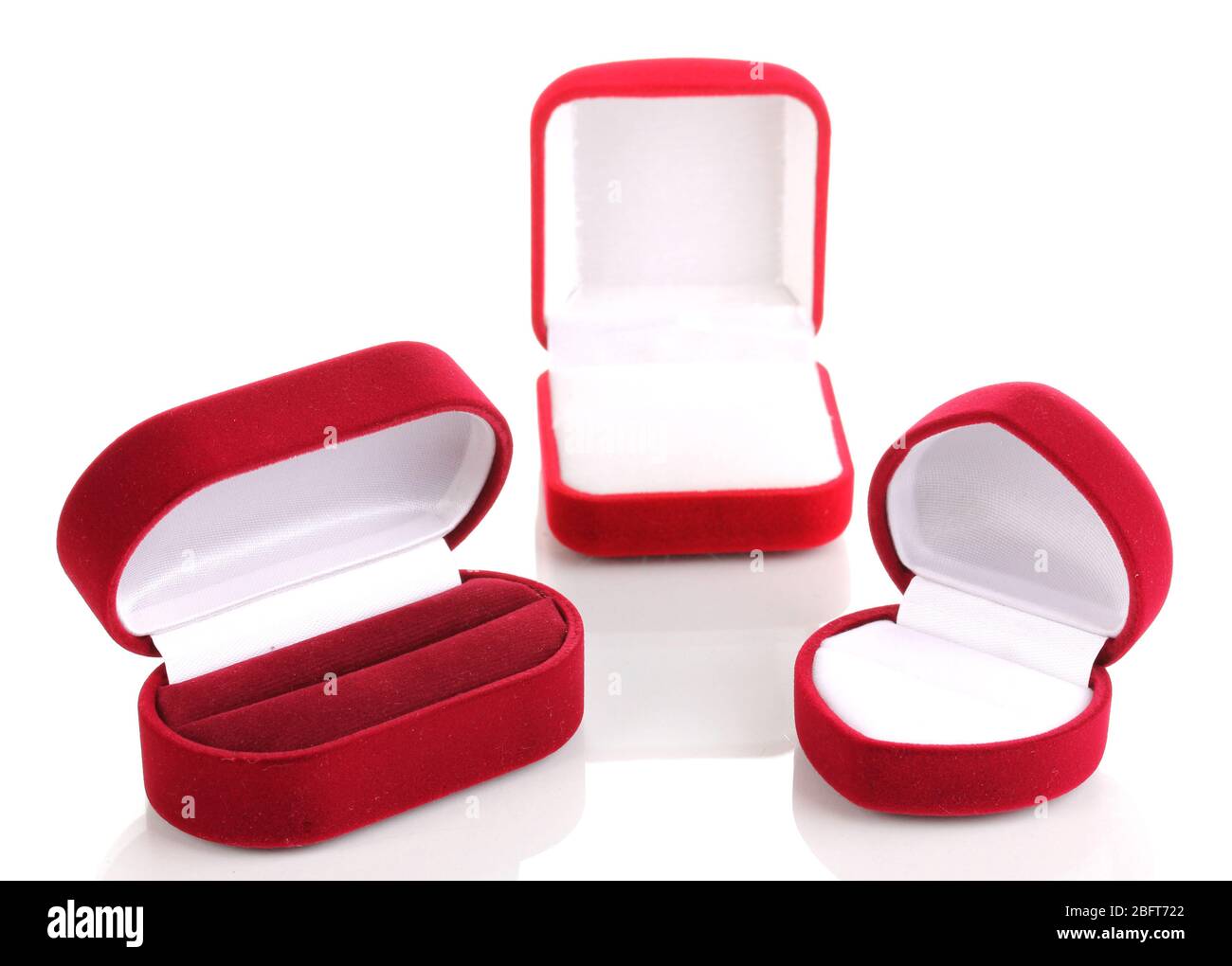 Red jewelry boxes isolated on white Stock Photo - Alamy
