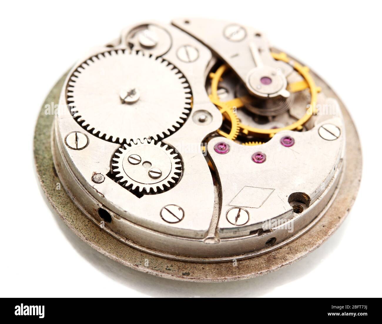 Clock mechanism isolated on white Stock Photo - Alamy