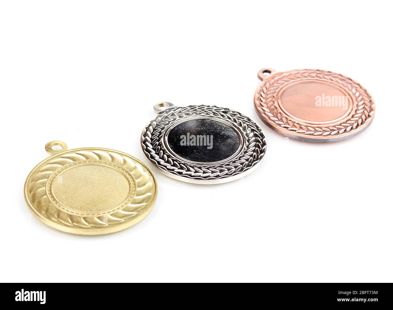 Three medals isolated on white Stock Photo - Alamy