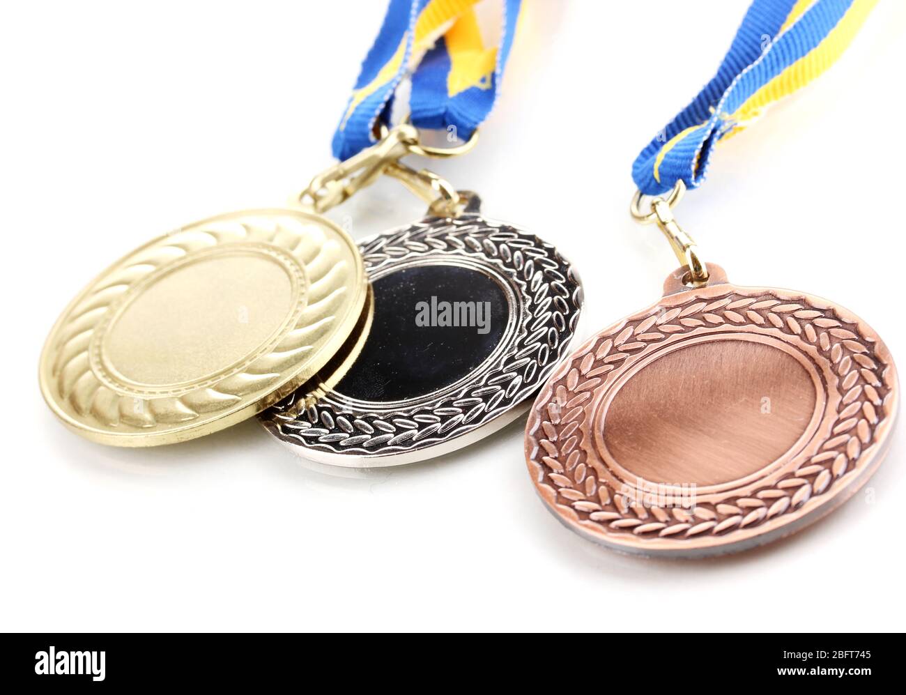 Three medals isolated on white Stock Photo - Alamy