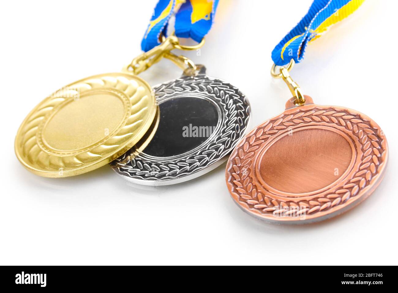 Three medals isolated on white Stock Photo - Alamy