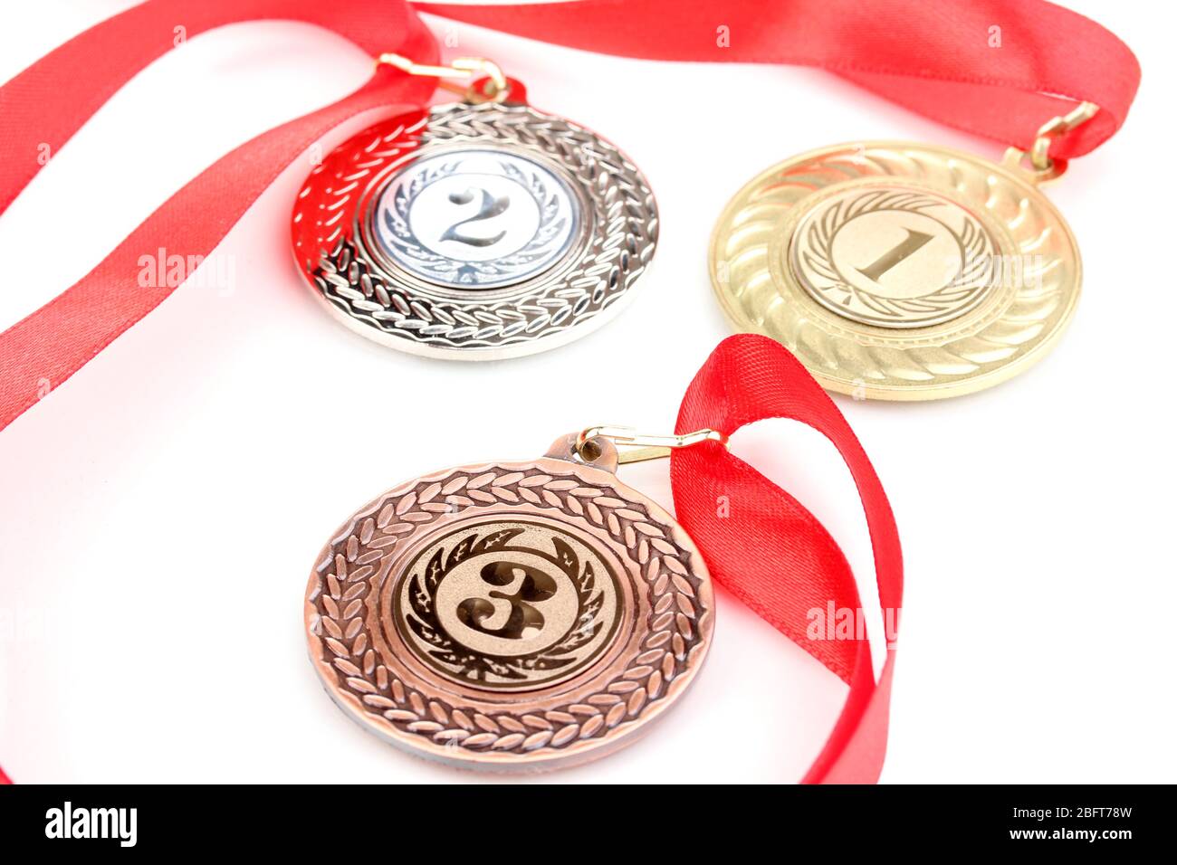 Three medals isolated on white Stock Photo - Alamy