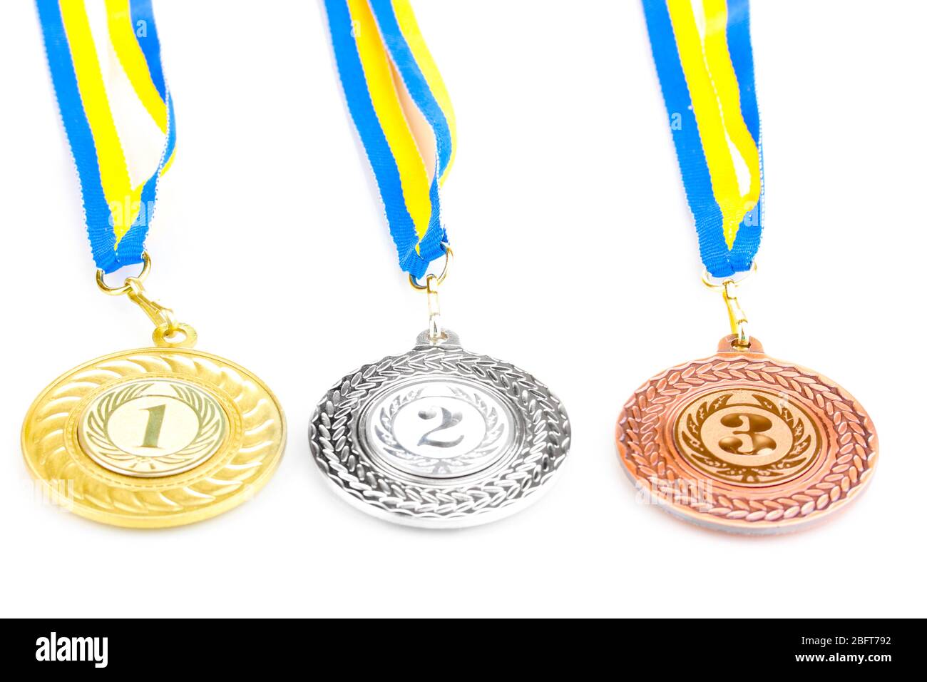 Three medals isolated on white Stock Photo - Alamy