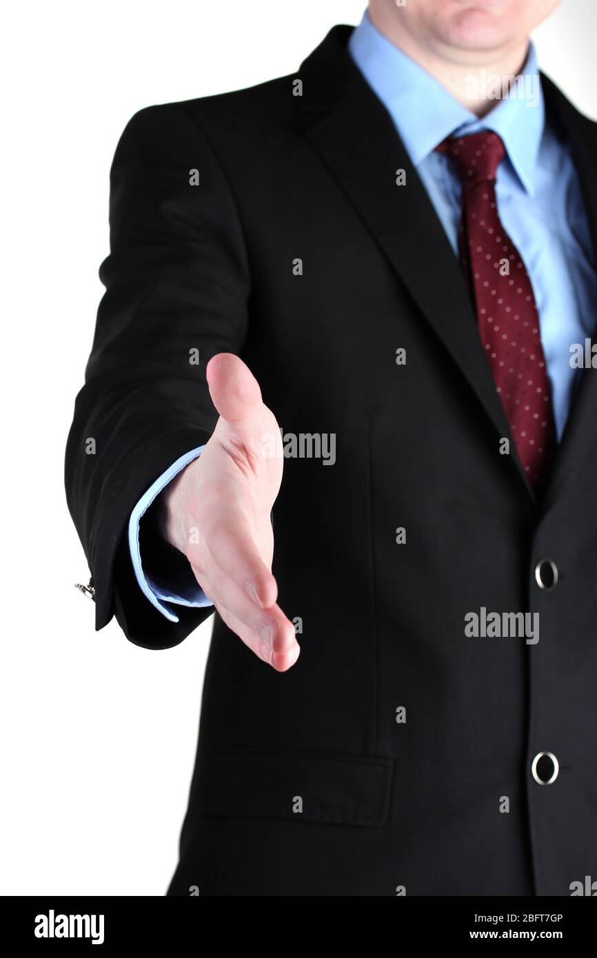 Businessman giving his hand for a handshake isolated on white Stock ...