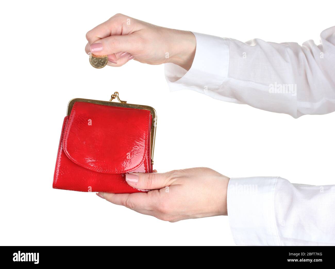 woman hand throwing coin in purse isolated on white Stock Photo - Alamy