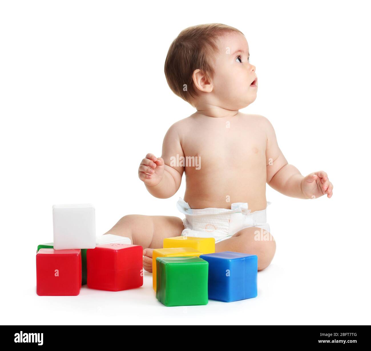 Cute baby girl playing with cubes isolated on white Stock Photo - Alamy