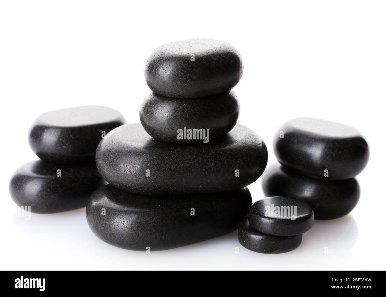 Spa stones isolated on white Stock Photo - Alamy