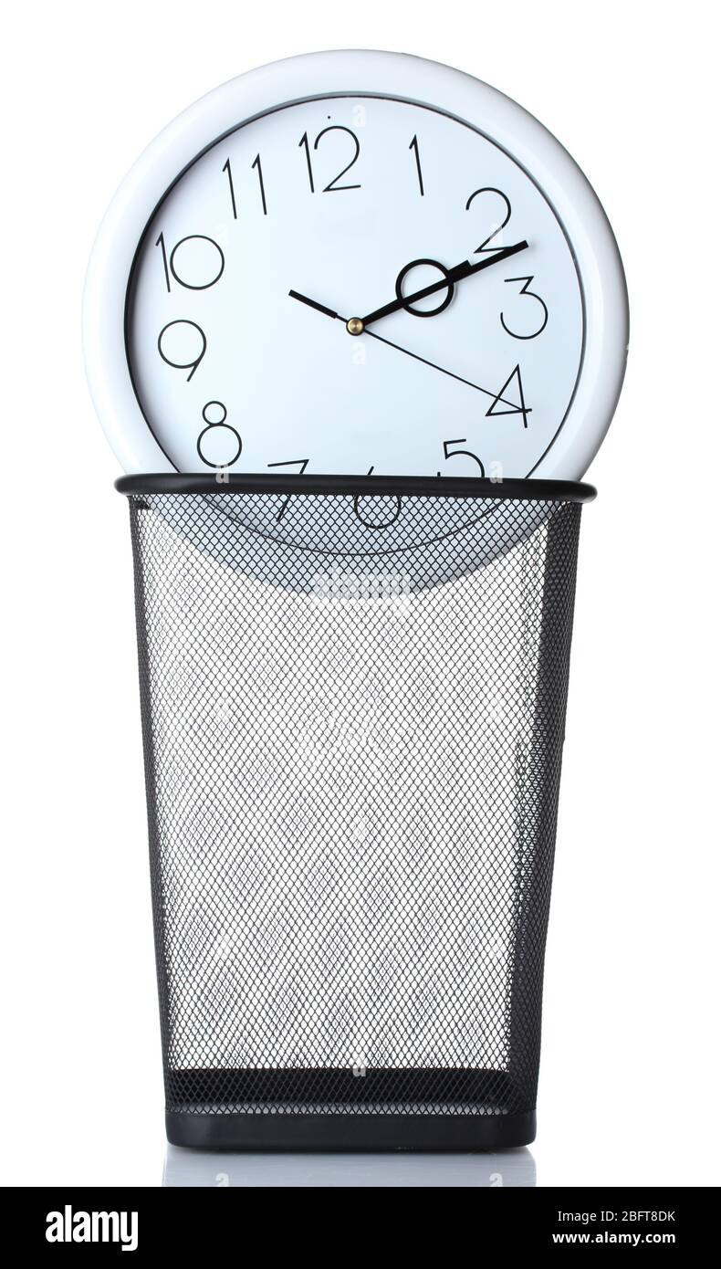 Wall Clock in metal trash bin isolated on white Stock Photo - Alamy