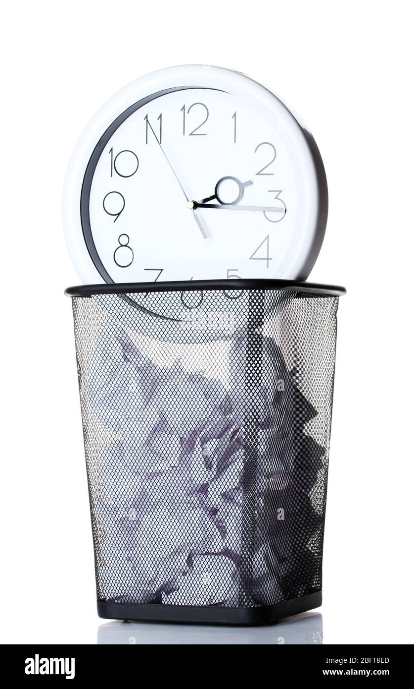 Wall Clock and paper in metal trash bin isolated on white Stock Photo ...