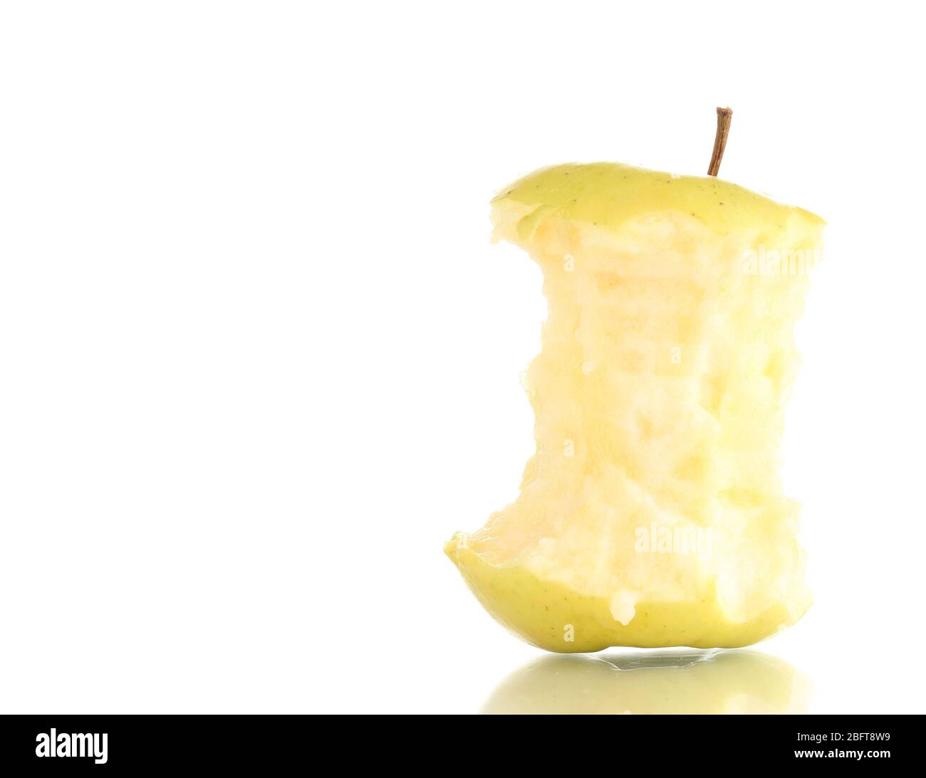 Green bitten apple isolated on white Stock Photo - Alamy