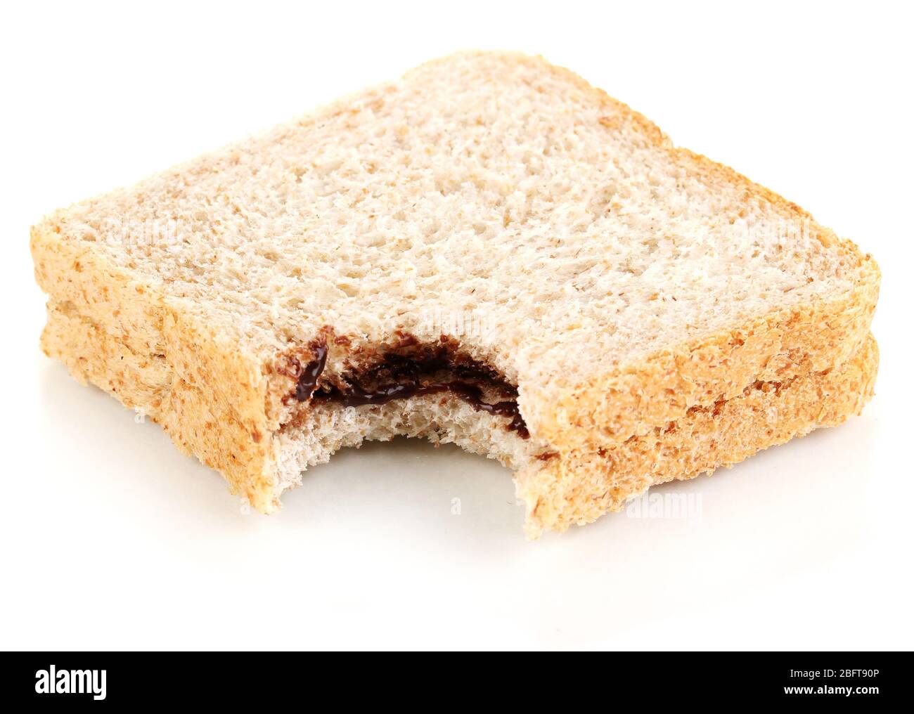 Bitten sandwich with chocolate isolated on white Stock Photo - Alamy