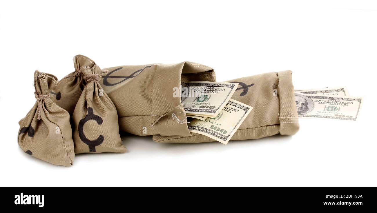 Bags with money isolated on white Stock Photo - Alamy